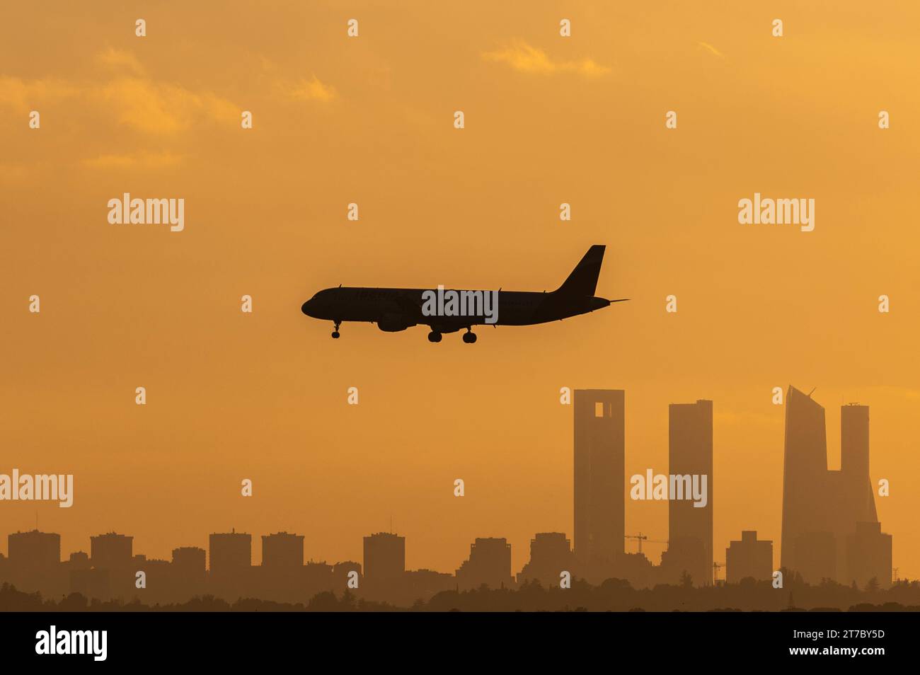 Madrid, Spain. 14th Nov, 2023. The silhouette of a commercial airplane ...