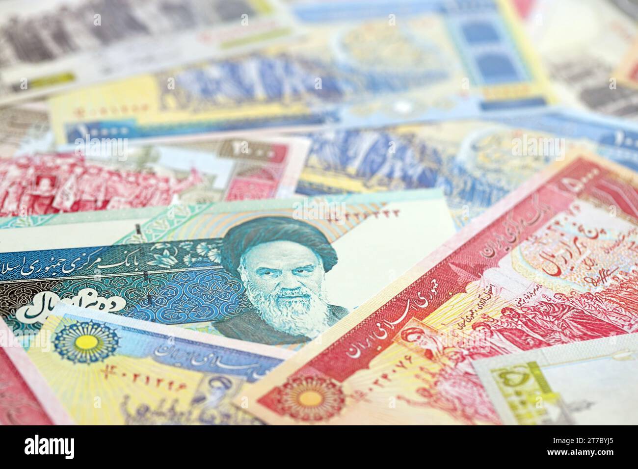 Big pile of Iranian Rial IRR banknotes from Iran as the background on ...
