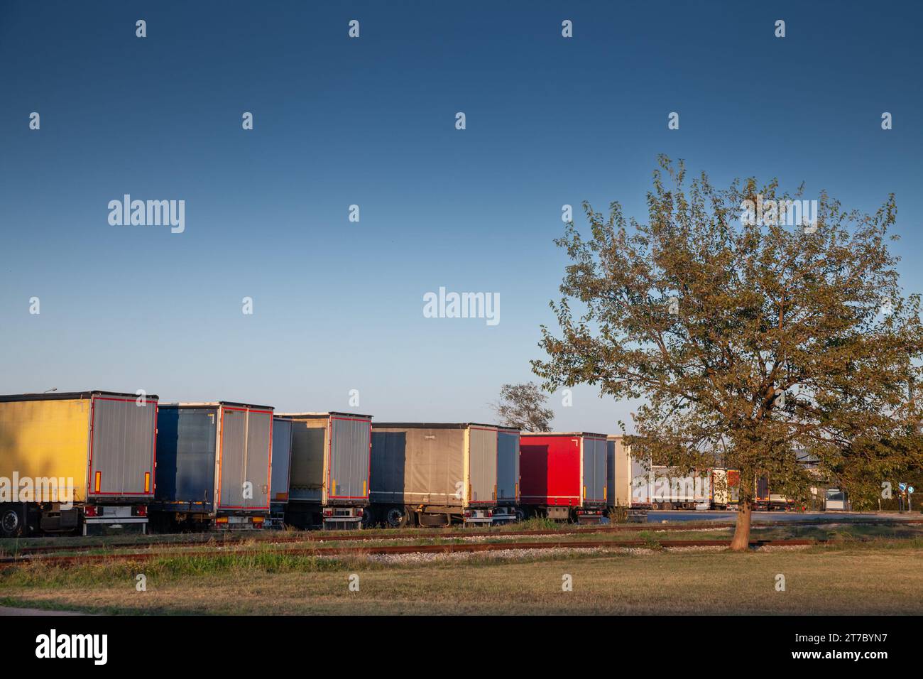 Picture of a row of semi trucks, european lorries and trucks, parked at ...