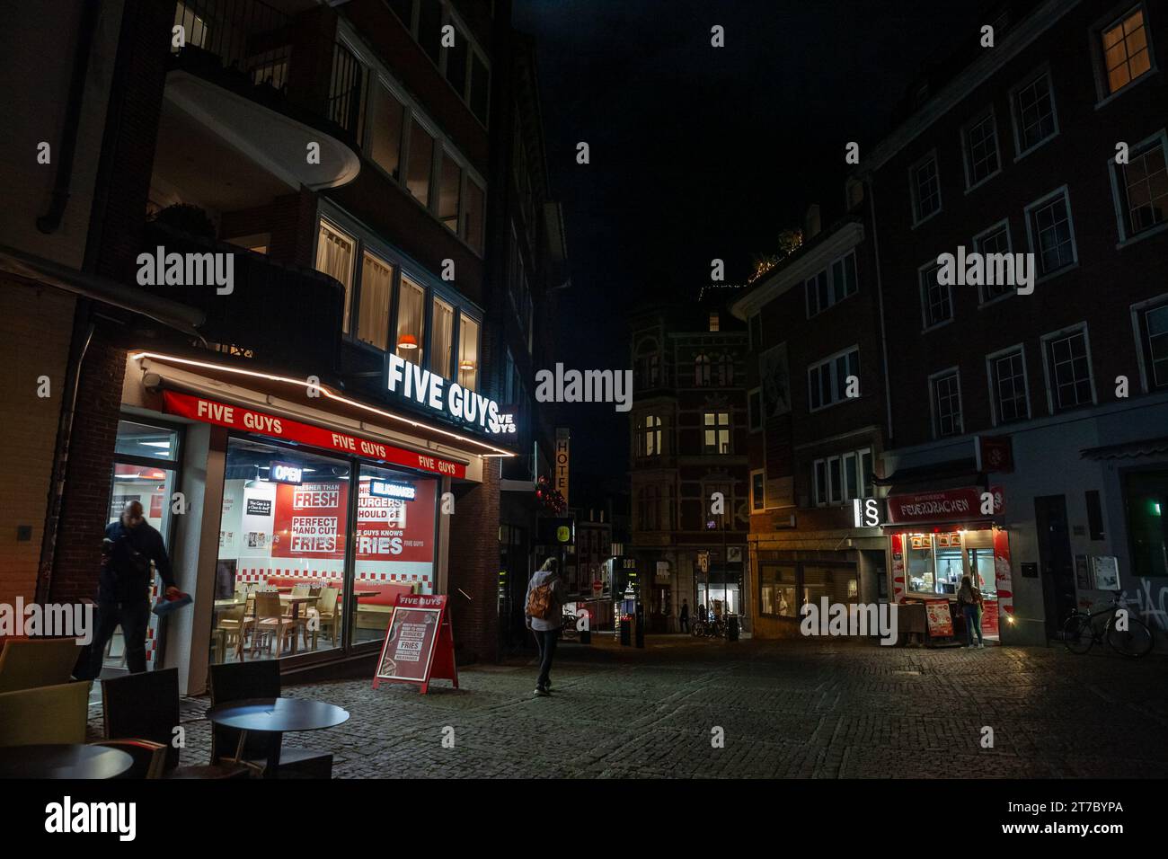 Picture of a sign with the logo of Five Guys on their local restaurant ...