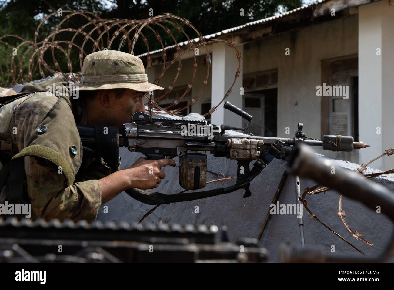 U.S. Army Spc. Brian Lopez, an infantryman assigned to Charlie Company ...