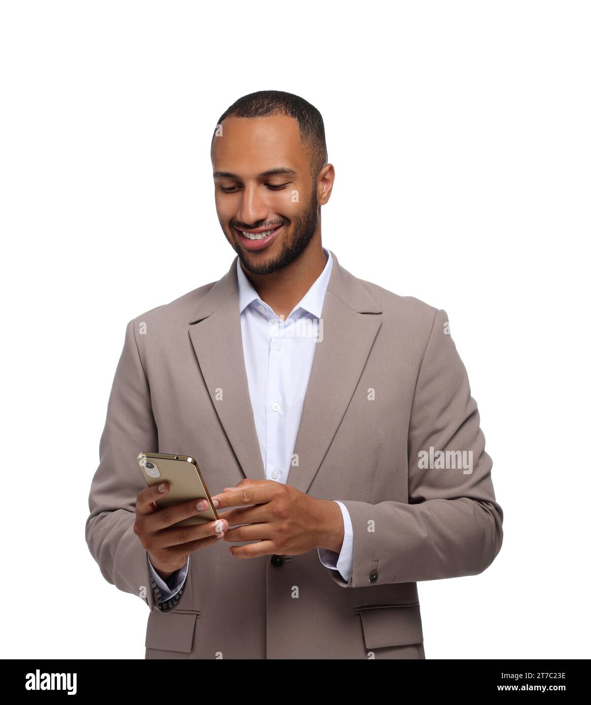 Happy man sending message via smartphone on white background Stock ...