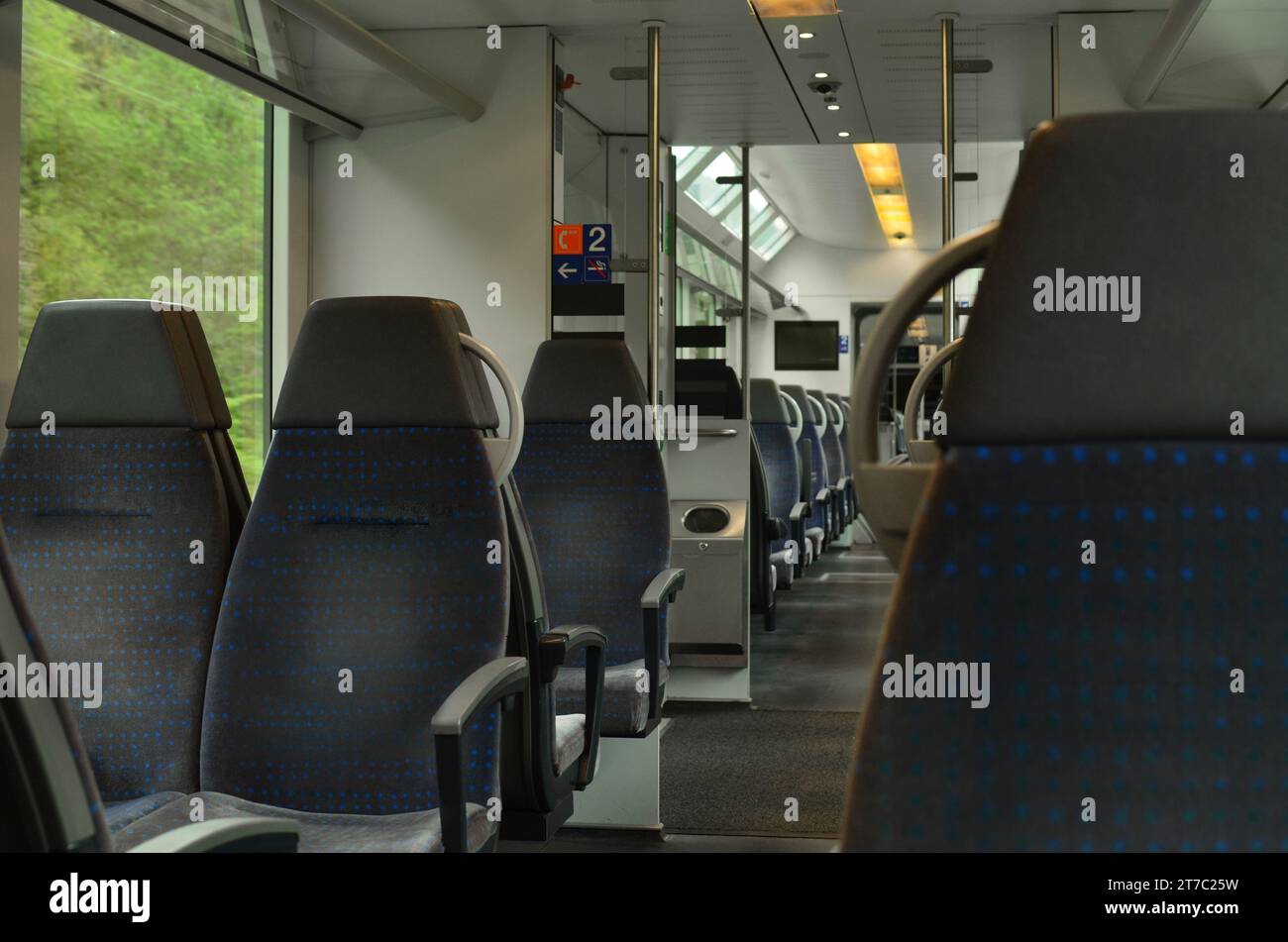 Comfortable seats in empty modern passenger train Stock Photo - Alamy