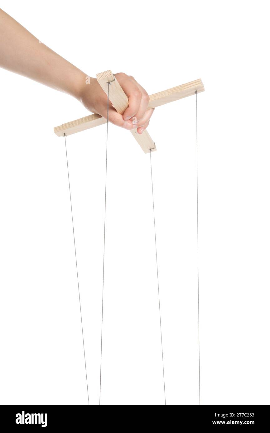 Woman pulling strings of puppet on white background, closeup Stock ...