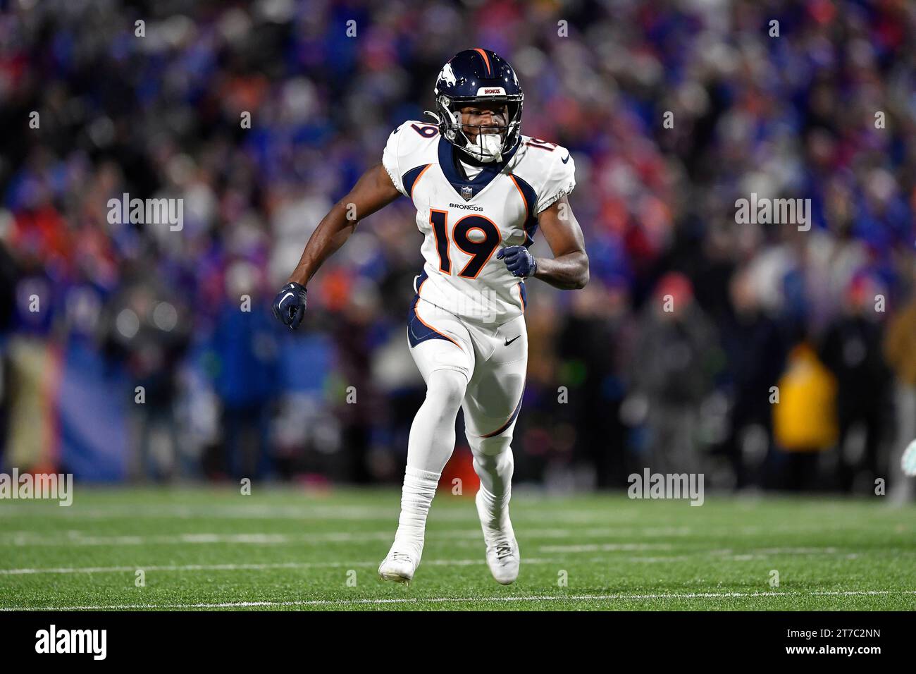 Denver Broncos wide receiver Marvin Mims Jr. (19) runs on the field during the first half of an ...