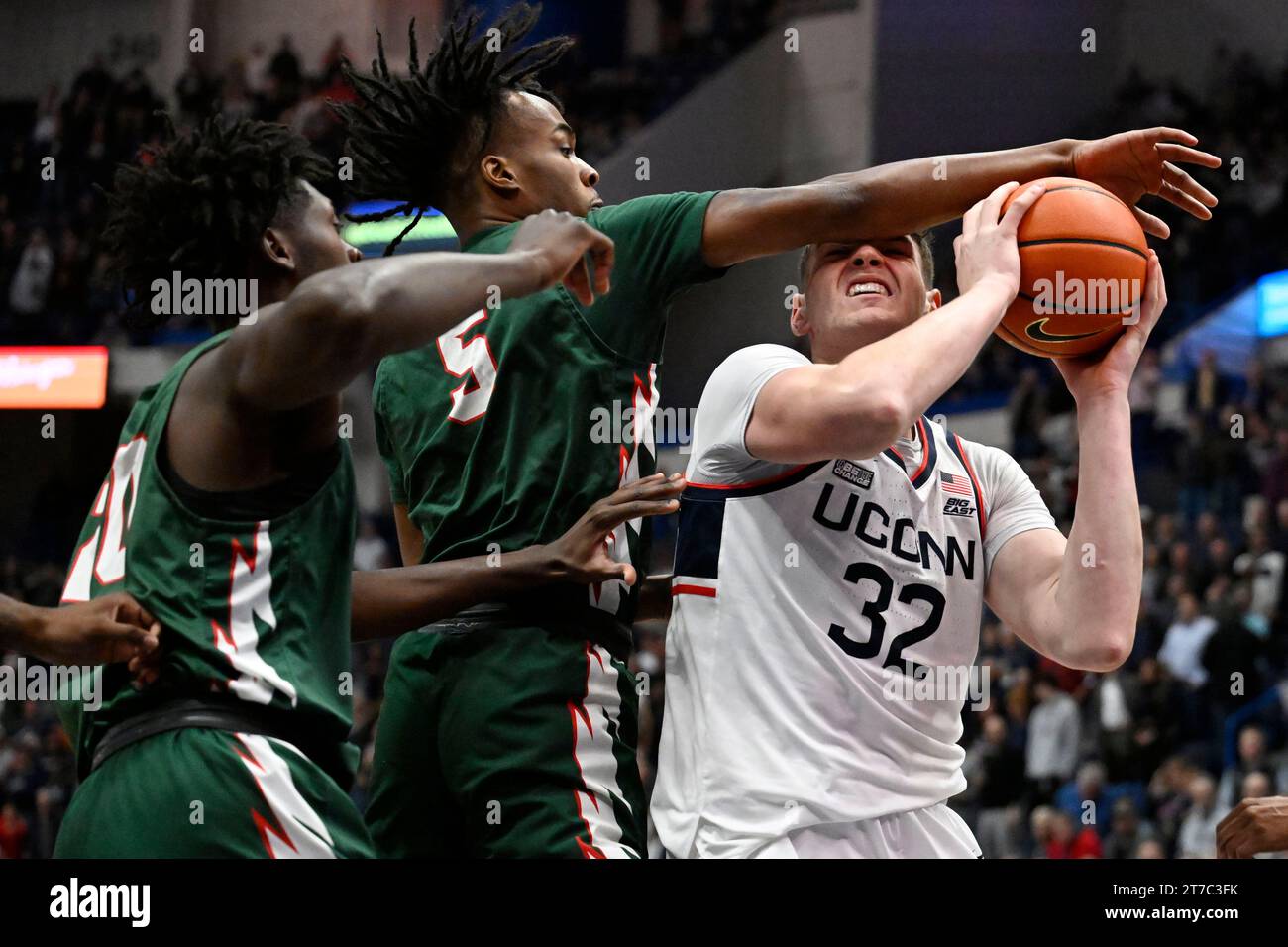 Mississippi Valley State forward Walter Hamilton (5) fouls UConn center ...