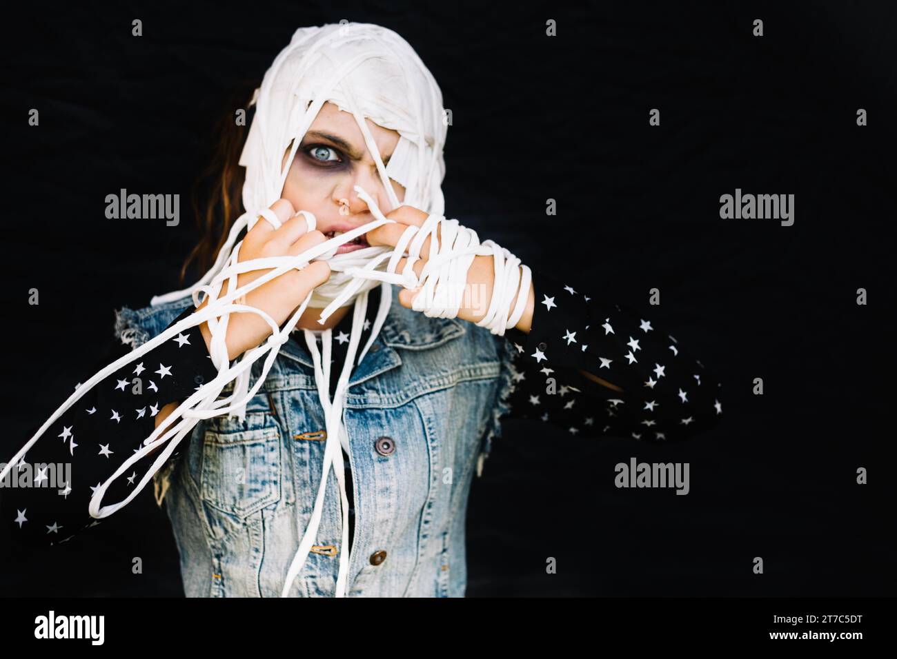 Woman taking off bandages Stock Photo - Alamy