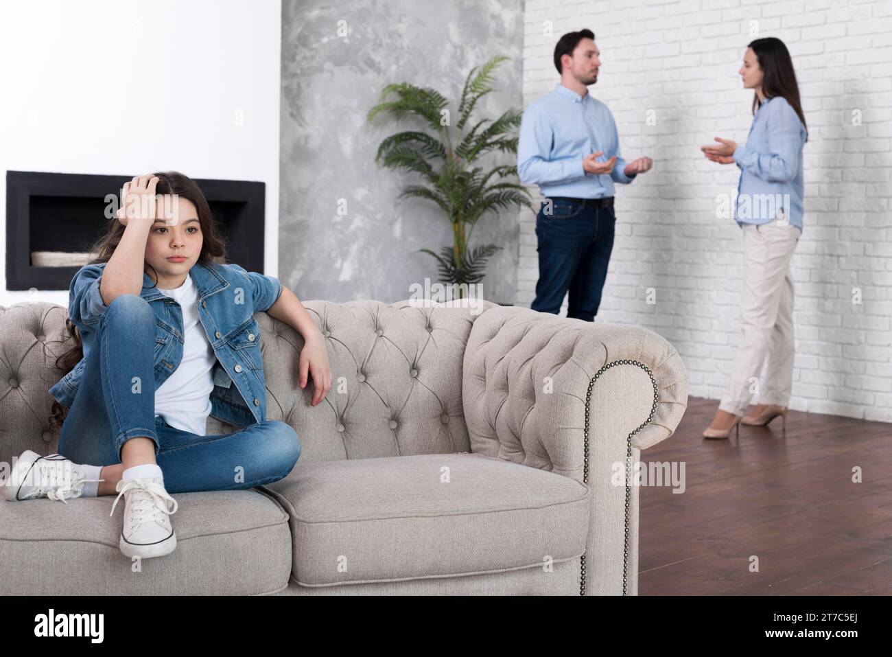 Young girl tired parents arguing Stock Photo - Alamy