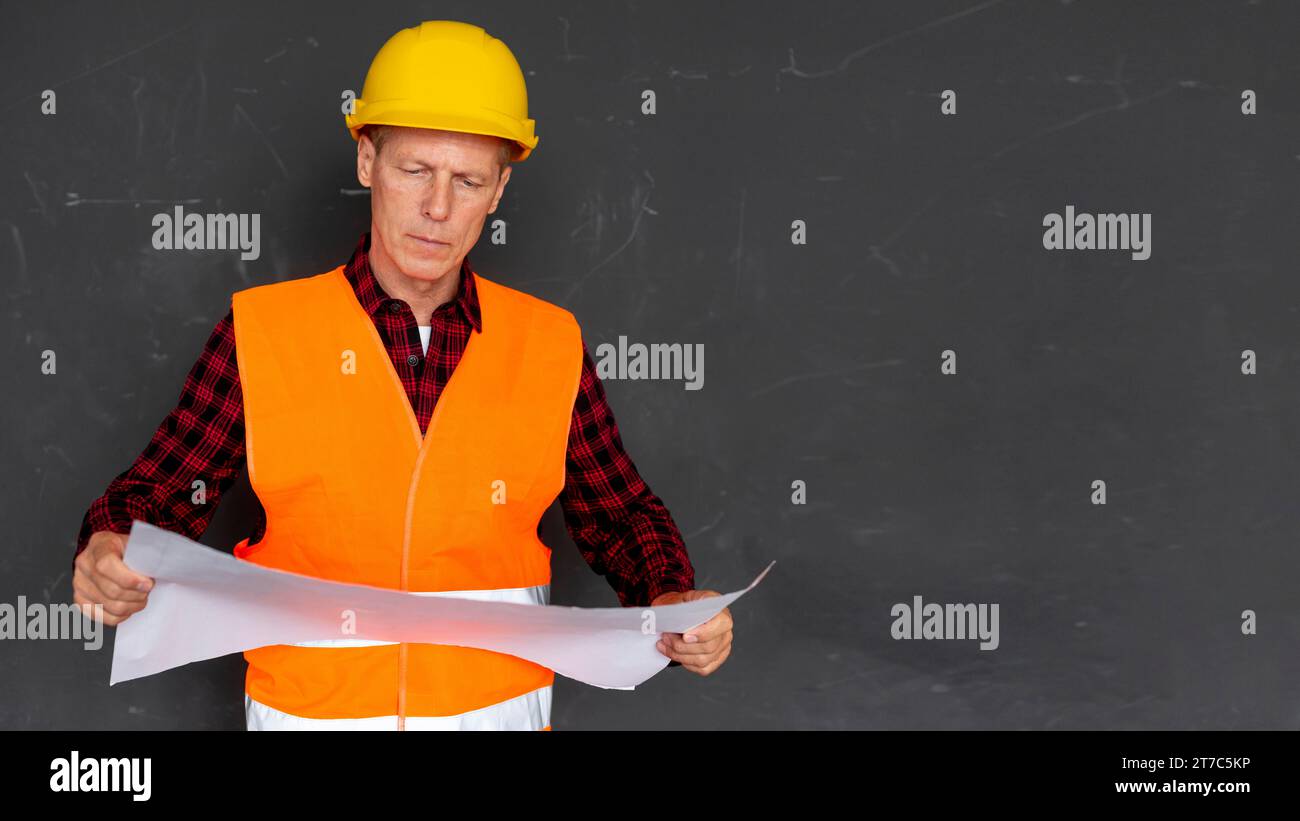 Site manager architect checking hi-res stock photography and images - Alamy