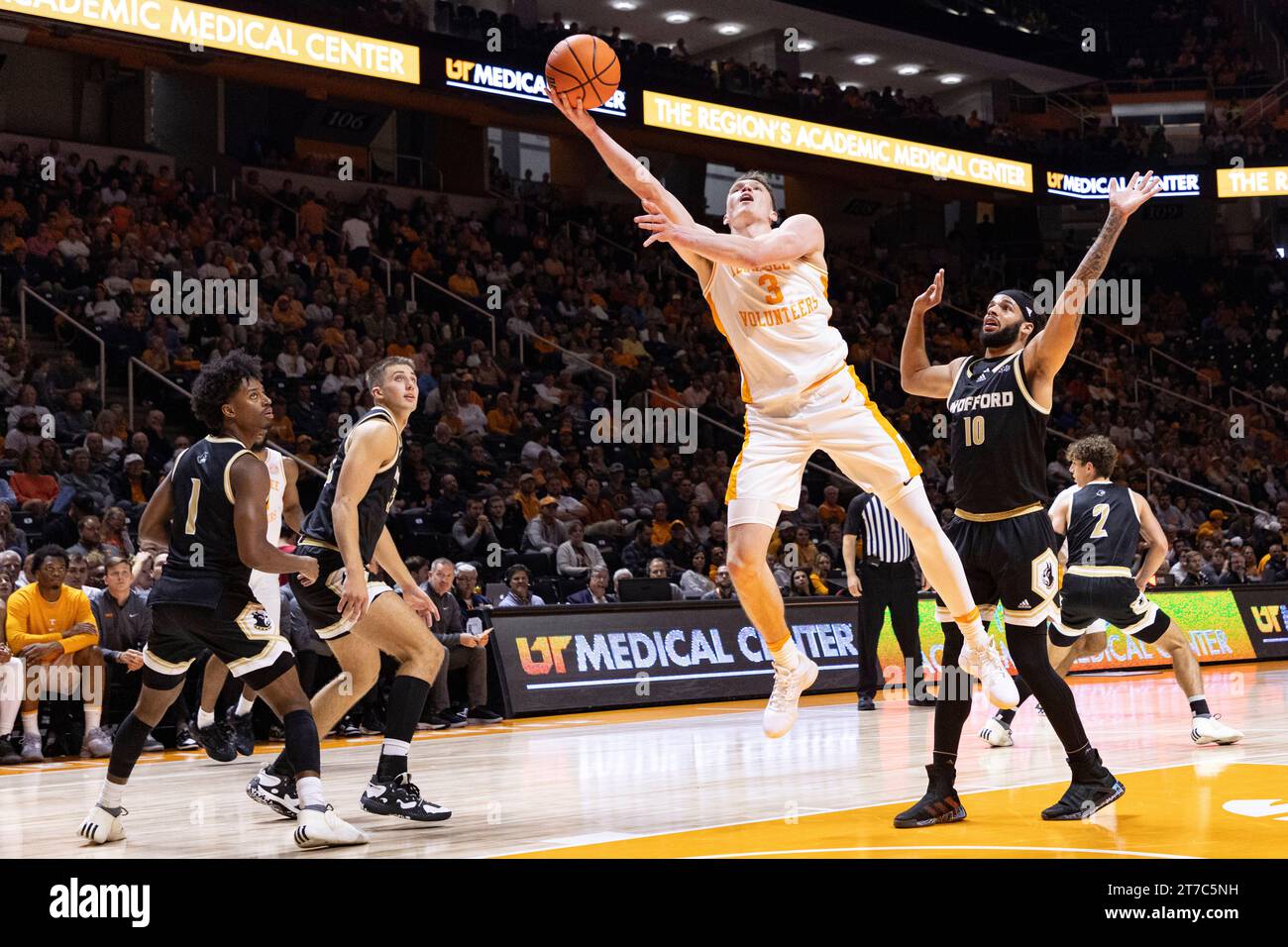 Tennessee guard Dalton Knecht (3) shoots past Wofford guard Corey Tripp ...