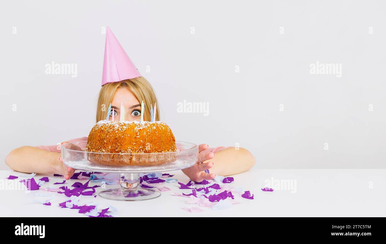 Birthday concept with womans face cake Stock Photo - Alamy