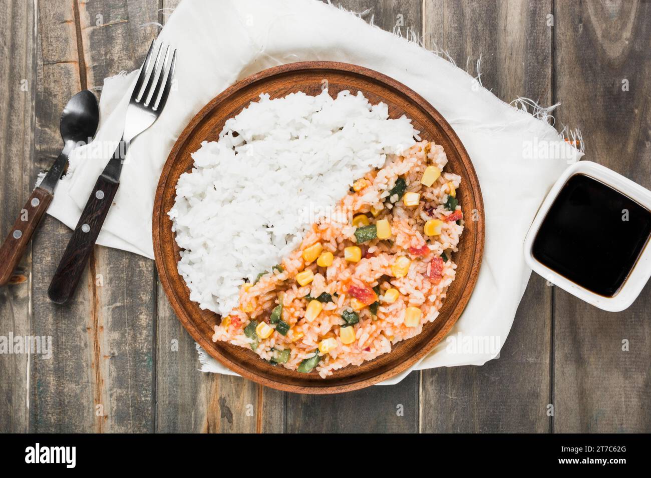 Chinese fried steamed rice wooden plate with soya sauce table Stock ...