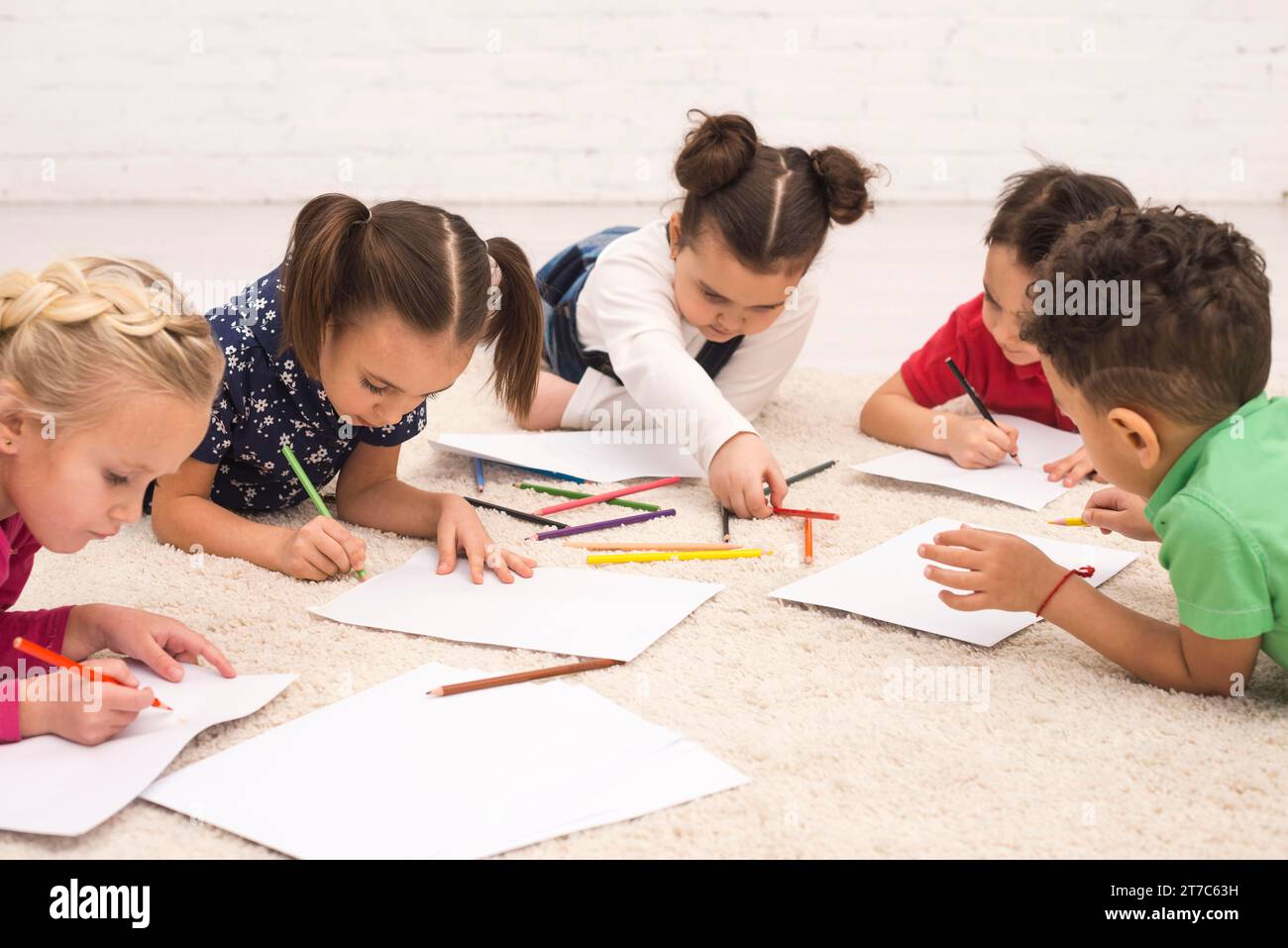Children group drawing Stock Photo - Alamy