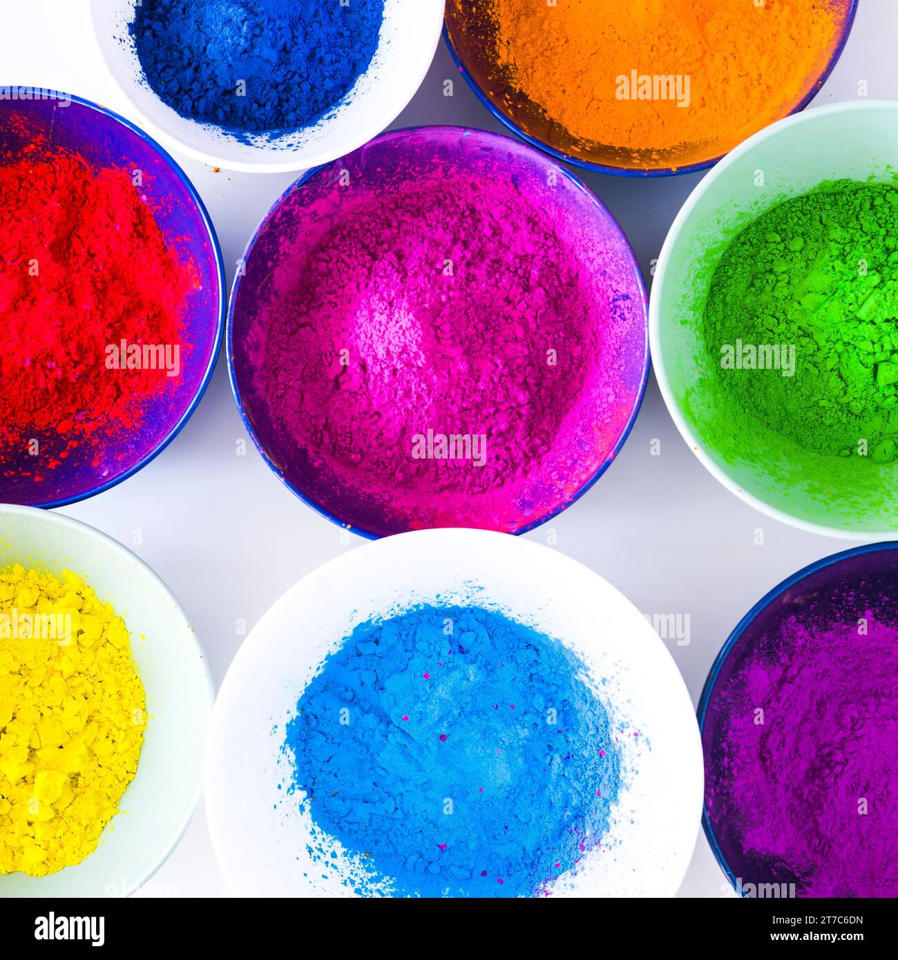 Different type holi color powder bowls Stock Photo - Alamy