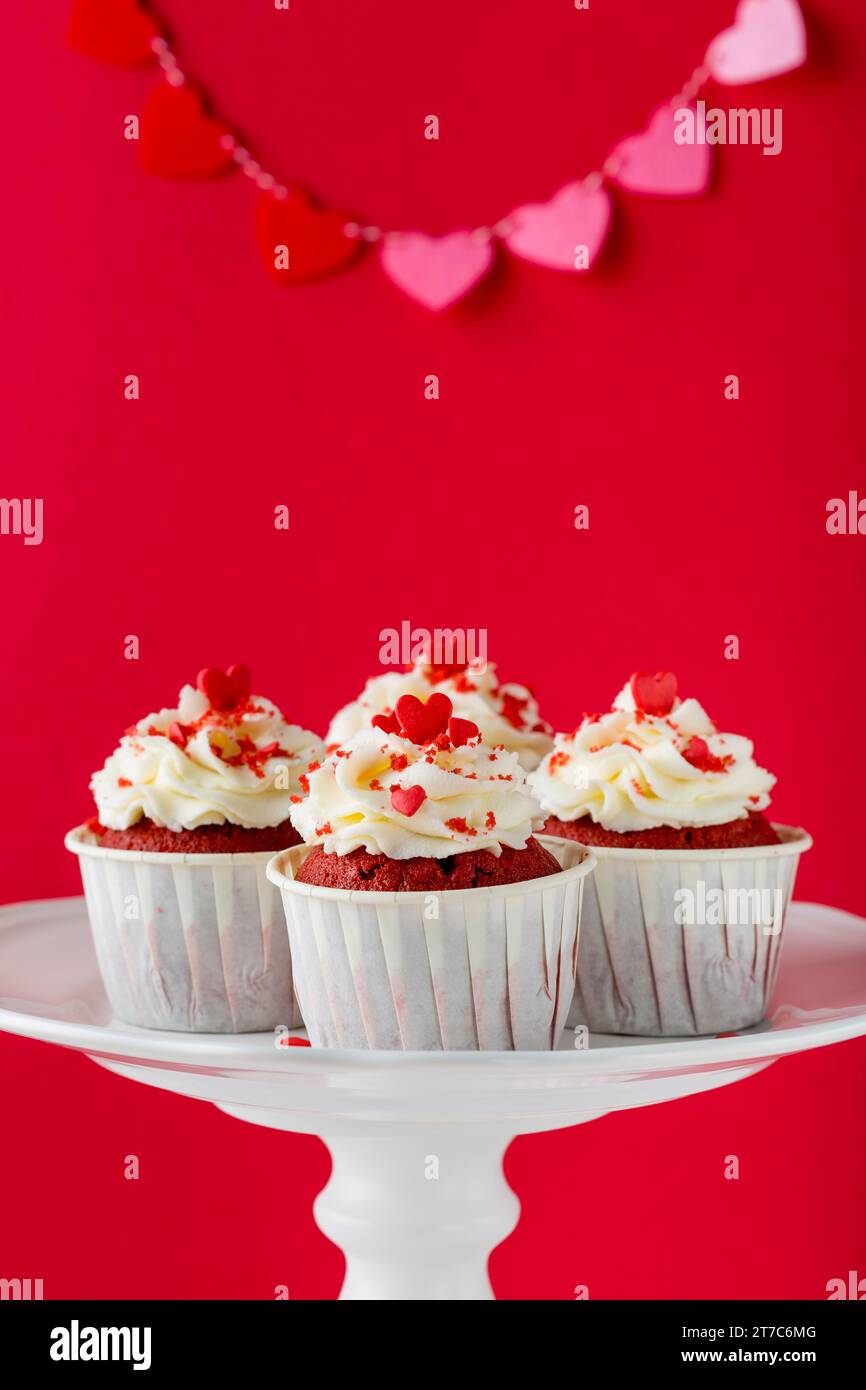 Front view cupcakes with heart shaped sprinkles Stock Photo - Alamy