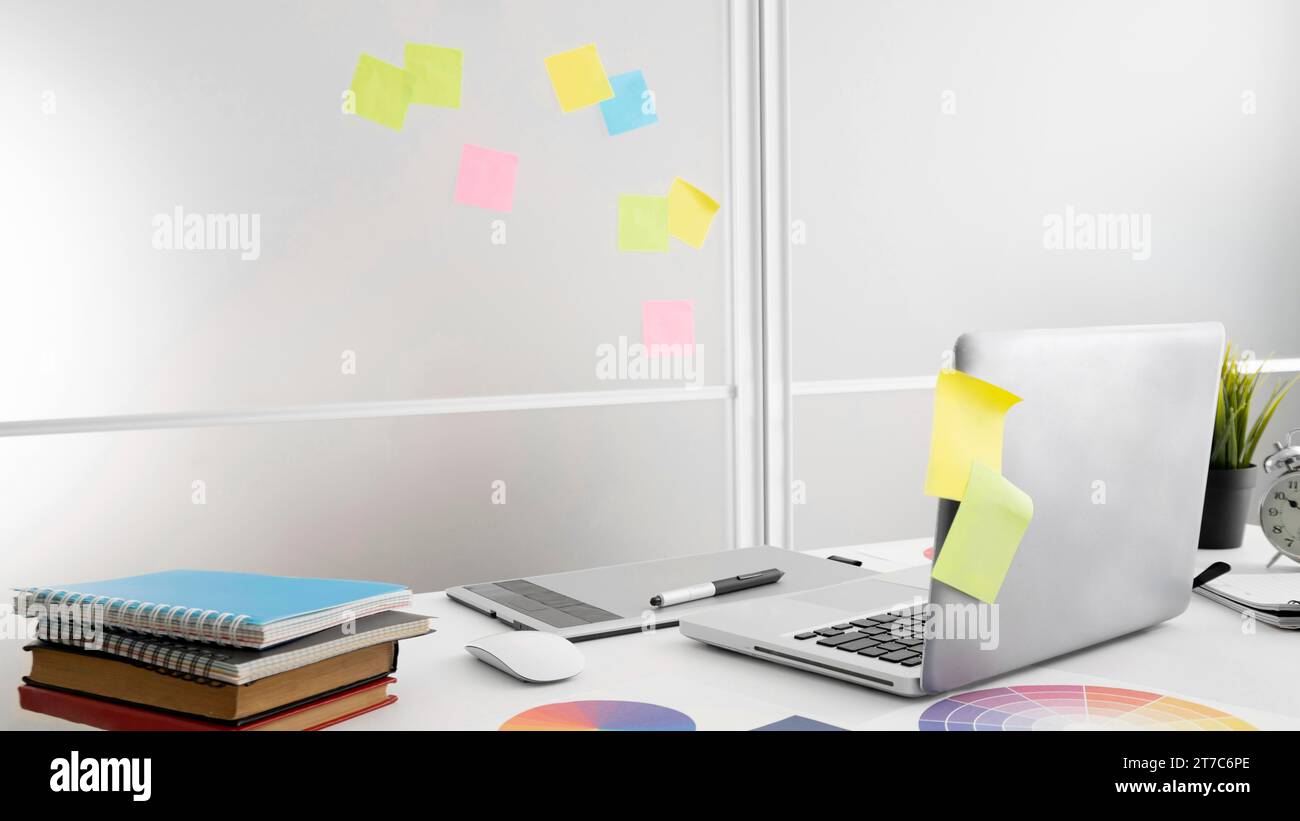 Front view laptop office desk Stock Photo - Alamy