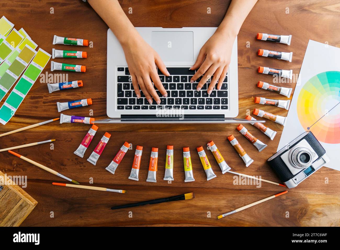 Graphic designer laptop with paint materials Stock Photo - Alamy
