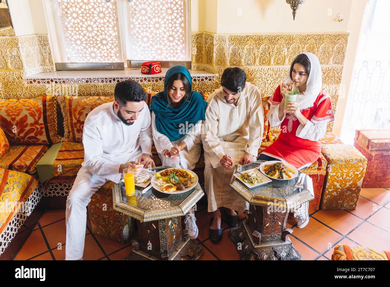 Group young muslim friends restaurant Stock Photo - Alamy