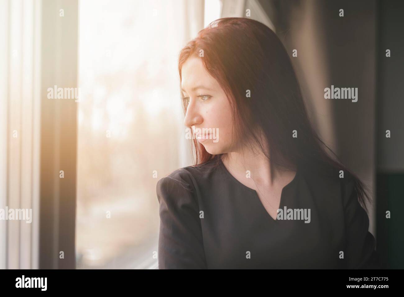 Lawyer looking through window Stock Photo - Alamy