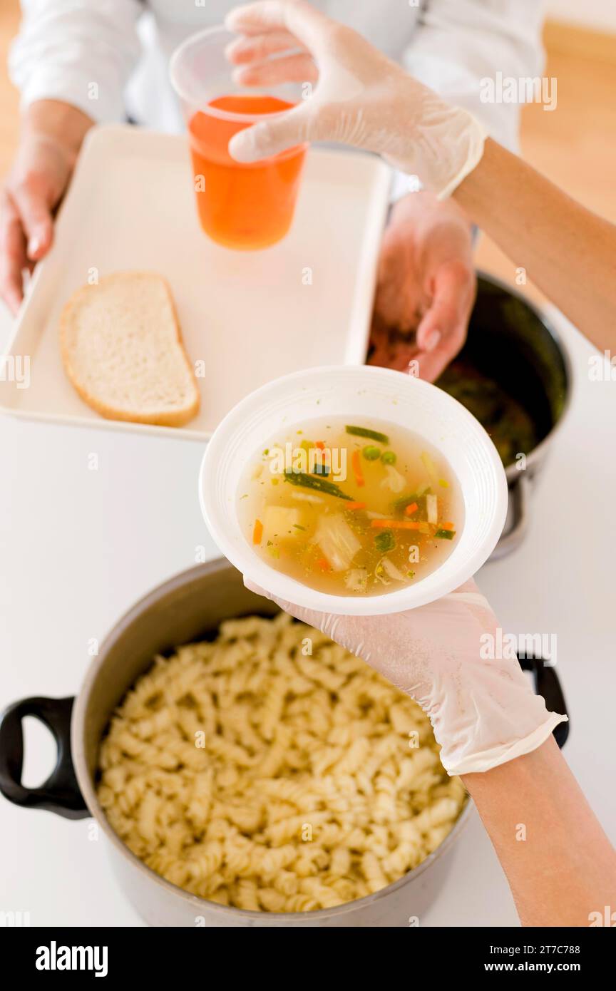 High angle person receiving food world food day Stock Photo - Alamy