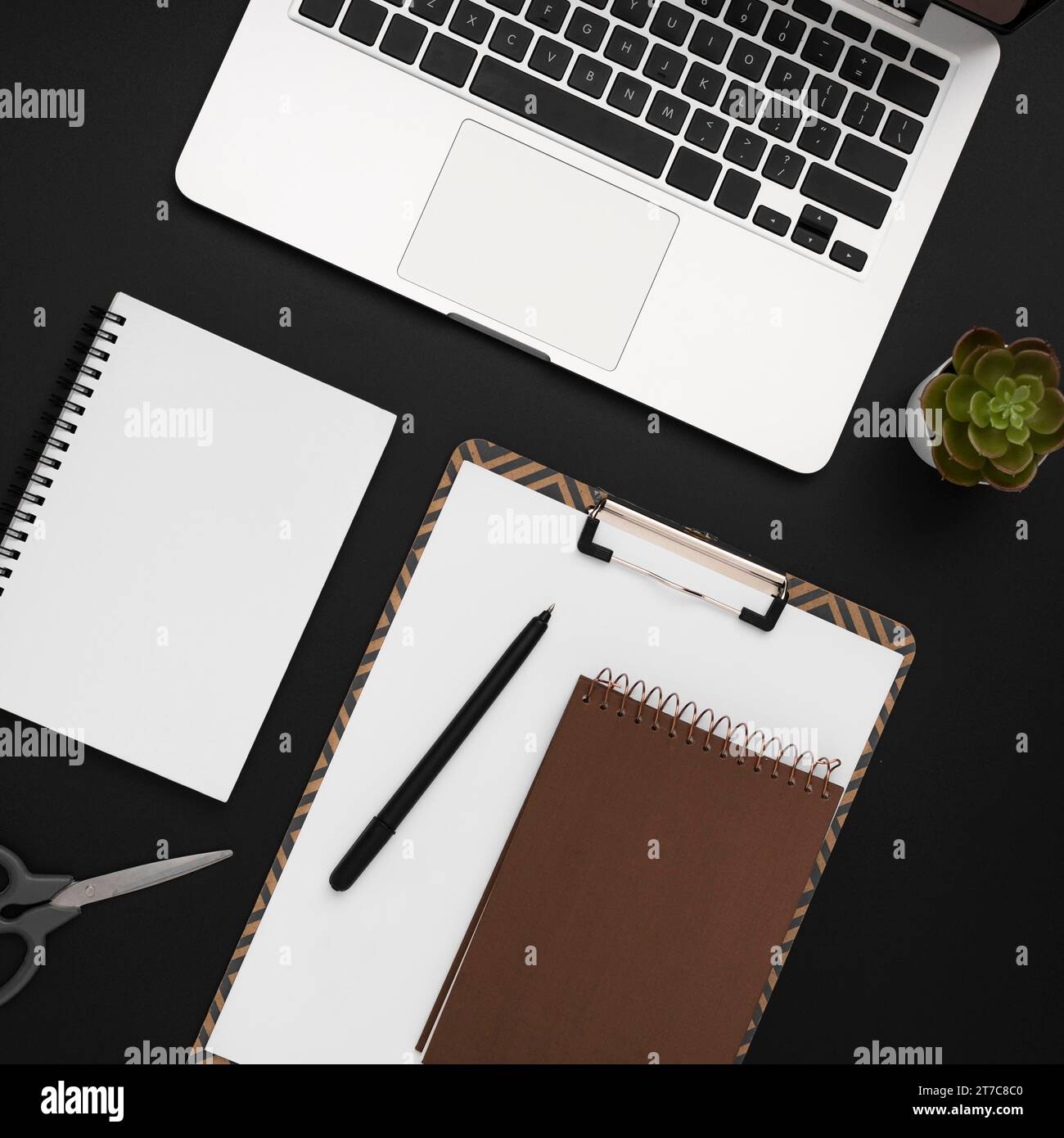 Top view workspace with notepad laptop Stock Photo - Alamy