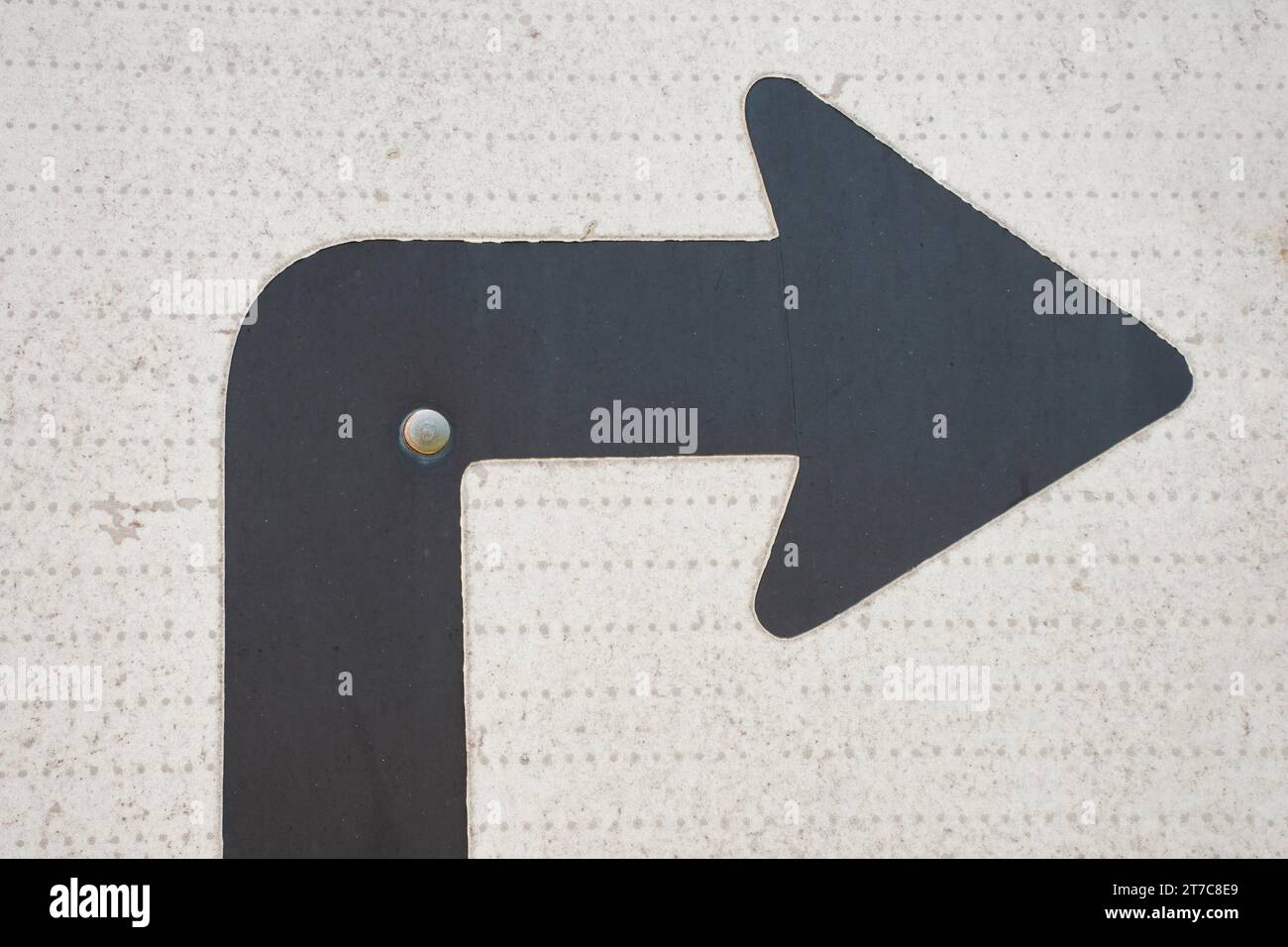 Traffic turn arrow sign thumbtack Stock Photo - Alamy
