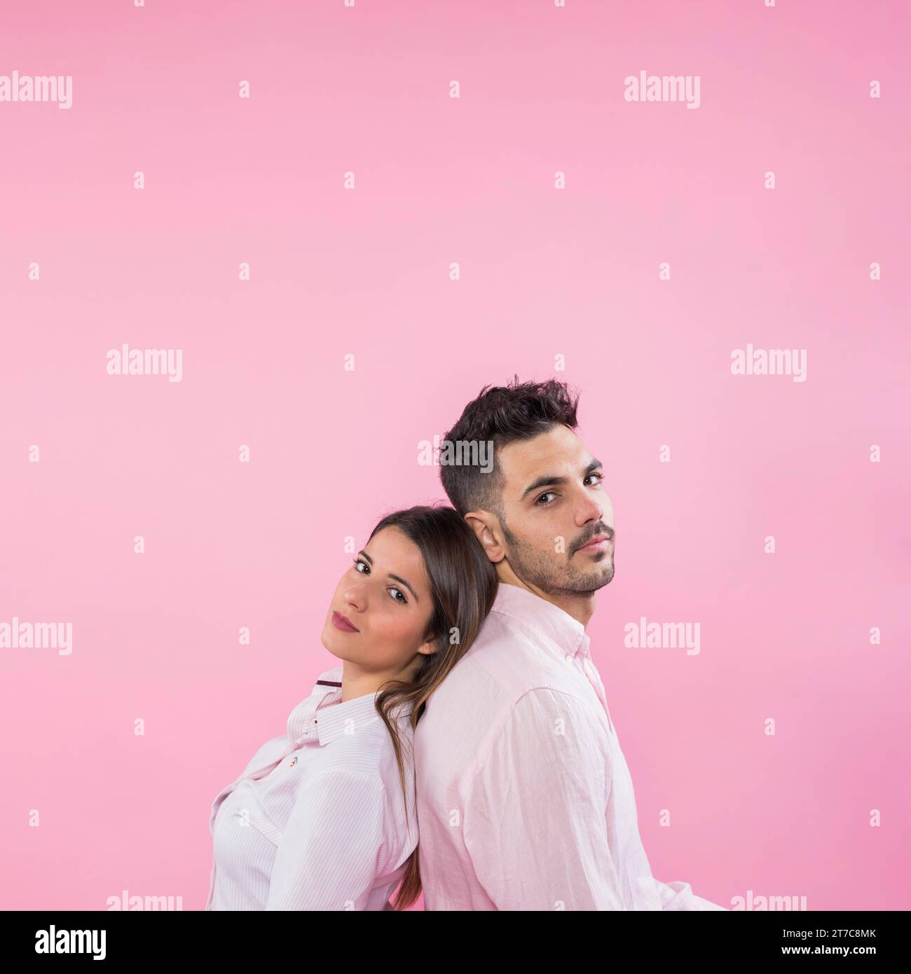 Young couple standing back back Stock Photo - Alamy Young couple standing back back Stock Photo - Alamy
