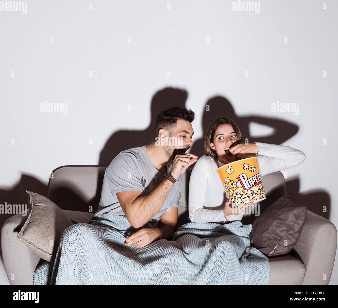 Man eating popcorn near hi-res stock photography and images - Alamy
