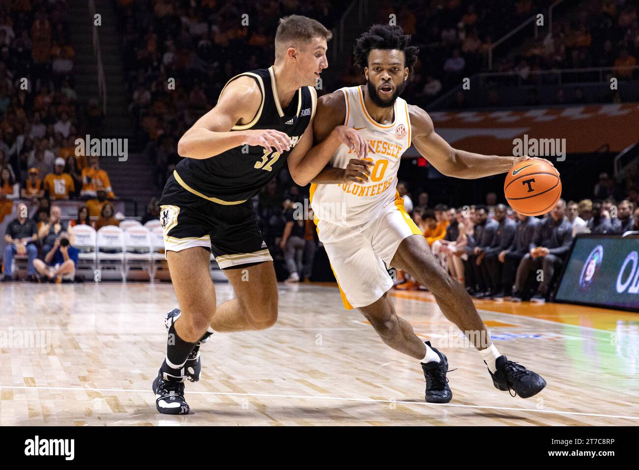 Tennessee guard Josiah-Jordan James (30) drives against Wofford forward ...