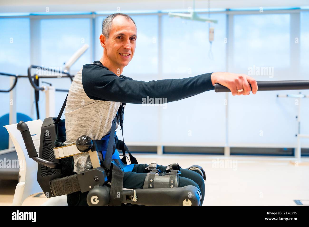 Mechanical exoskeleton. Portrait of disabled person with robotic ...