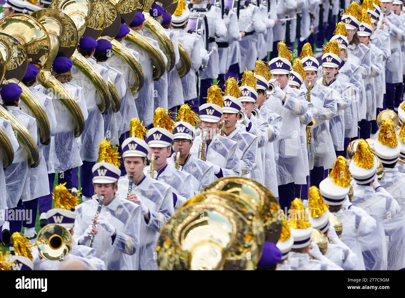 The Washington Husky Marching Band performs on the field before an NCAA ...