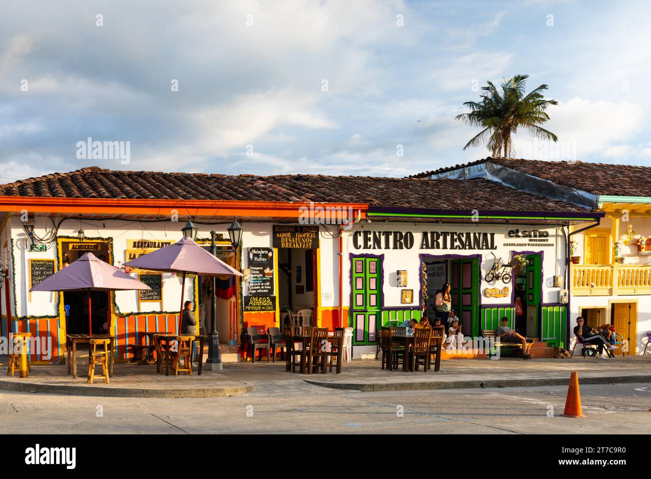 Historic Paisa style houses, outdoor seating of a restaurant, Plaza de ...