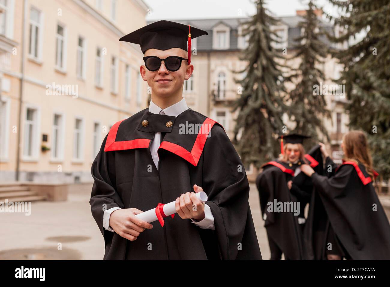 Front view student with diploma Stock Photo - Alamy