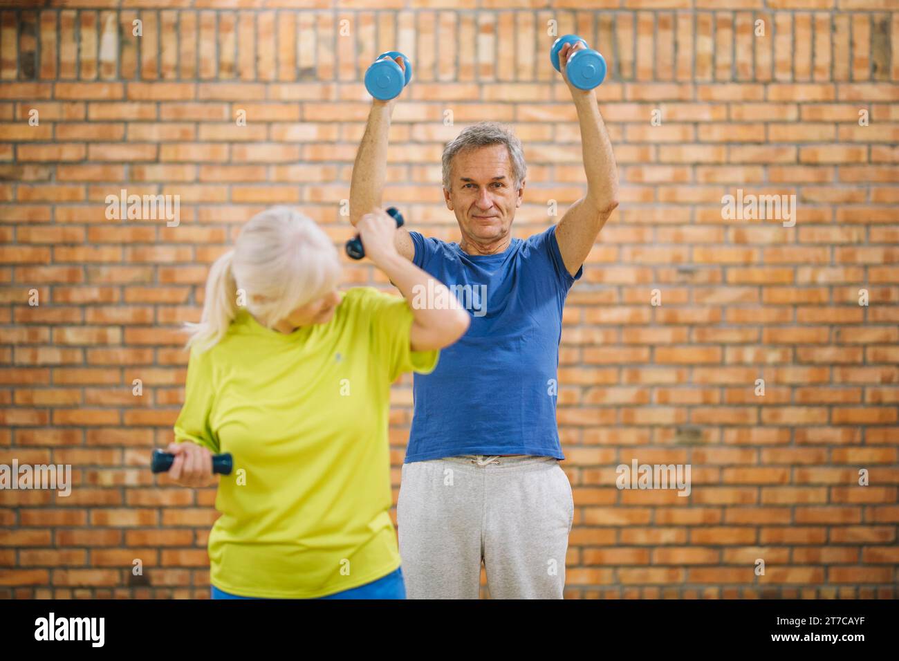 Grandparents working out gym Stock Photo - Alamy