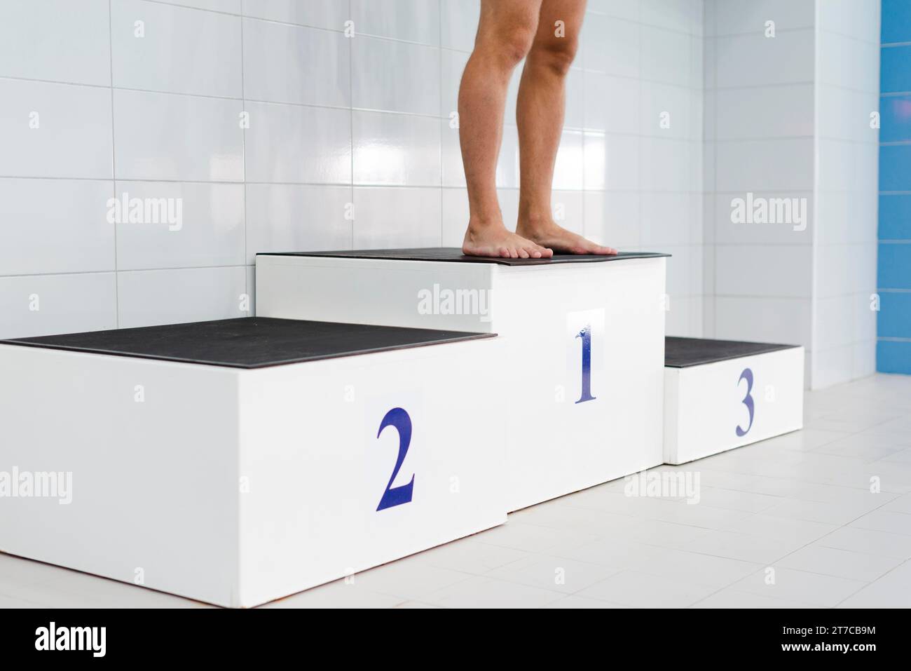 Man legs standing first position podium Stock Photo - Alamy