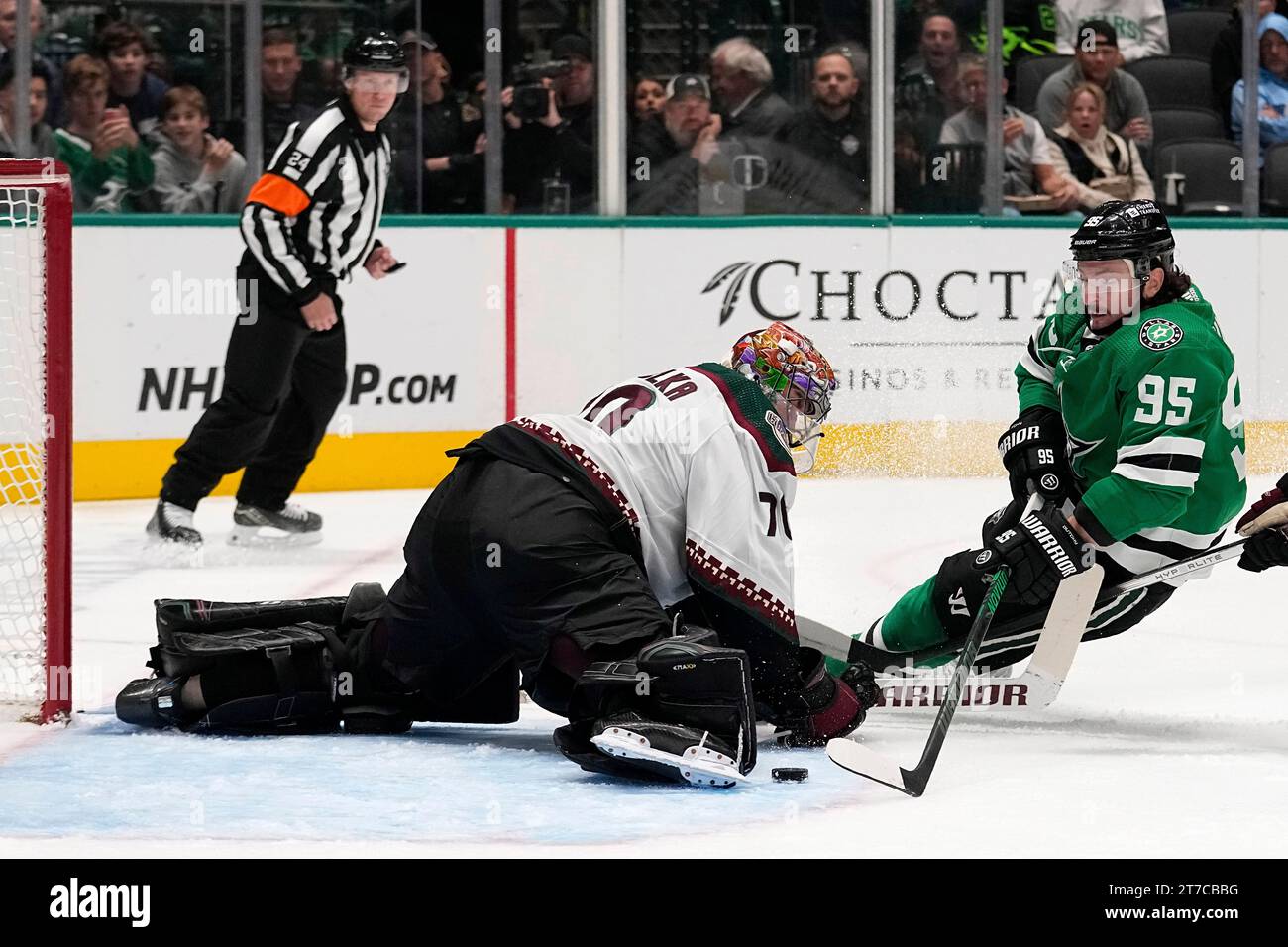 Arizona Coyotes goaltender Karel Vejmelka (70) blocks a shot by Dallas ...
