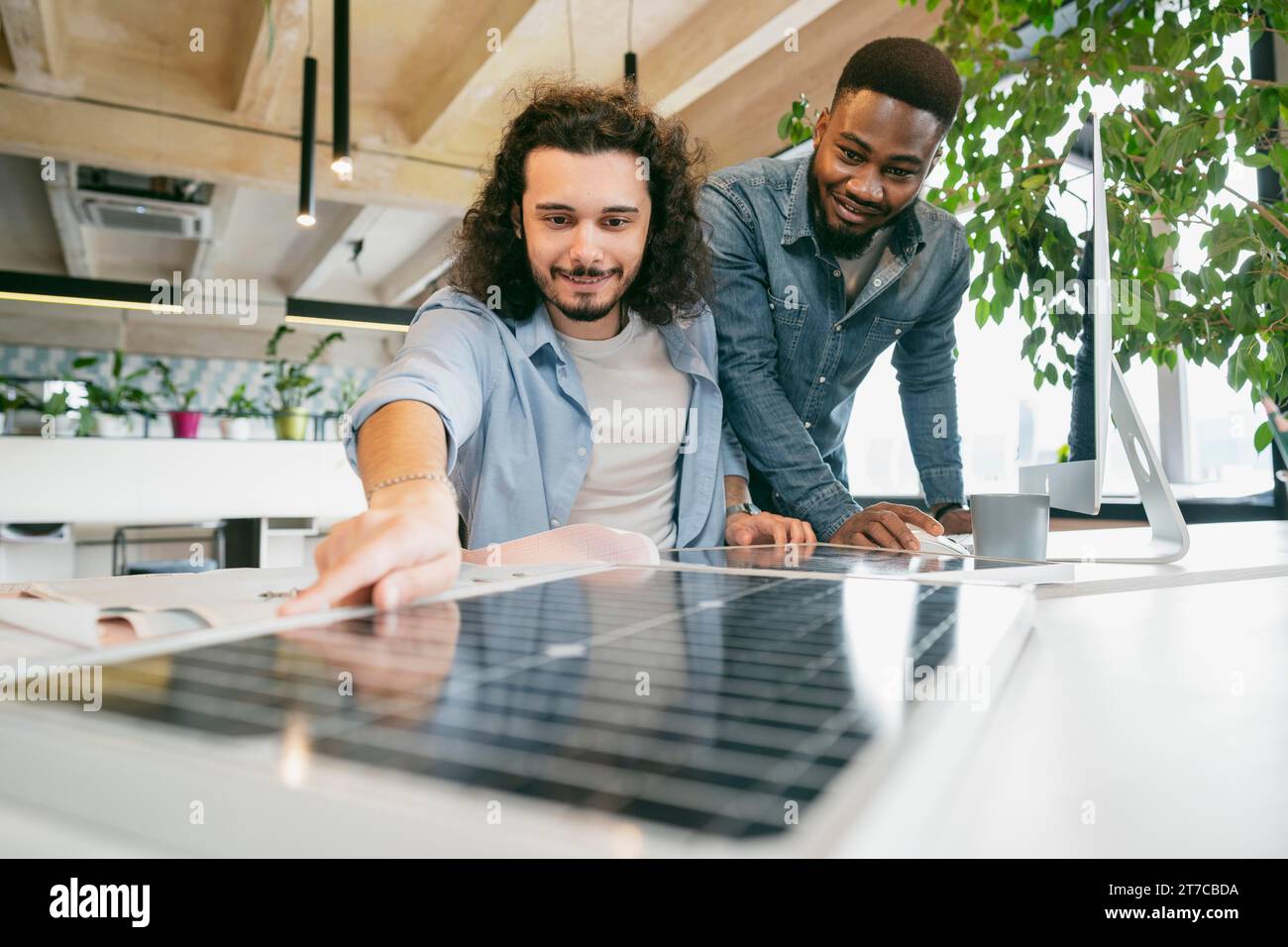 Medium shot men working project 3 Stock Photo - Alamy