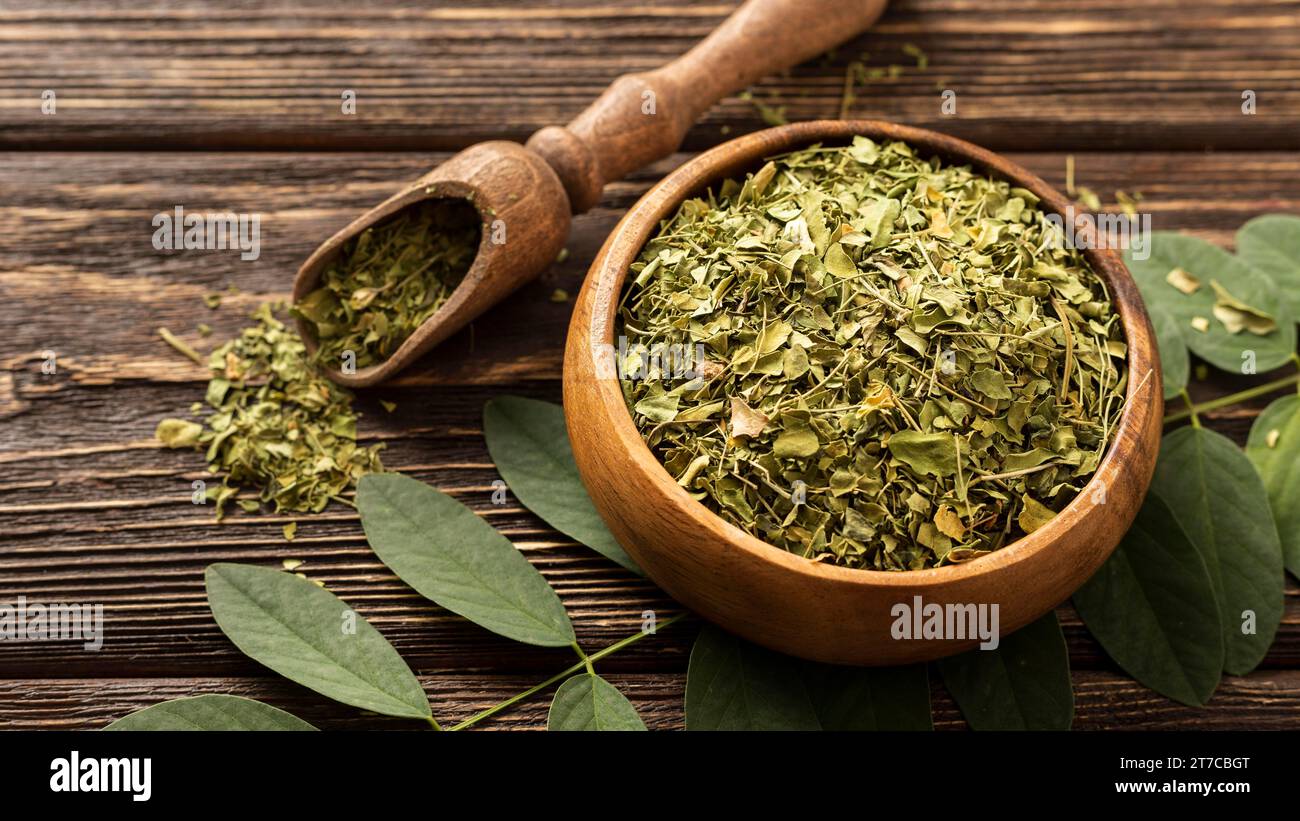 Natural crushed green leaves bowl Stock Photo - Alamy