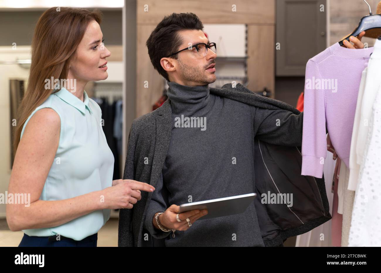 Portrait male personal shopper working Stock Photo - Alamy