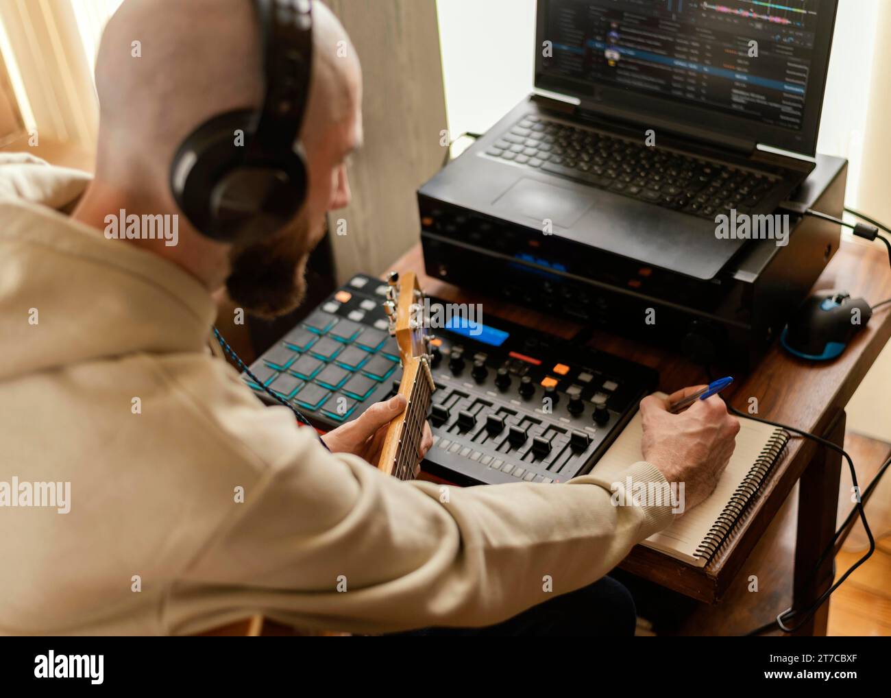 Person producing music home studio Stock Photo - Alamy