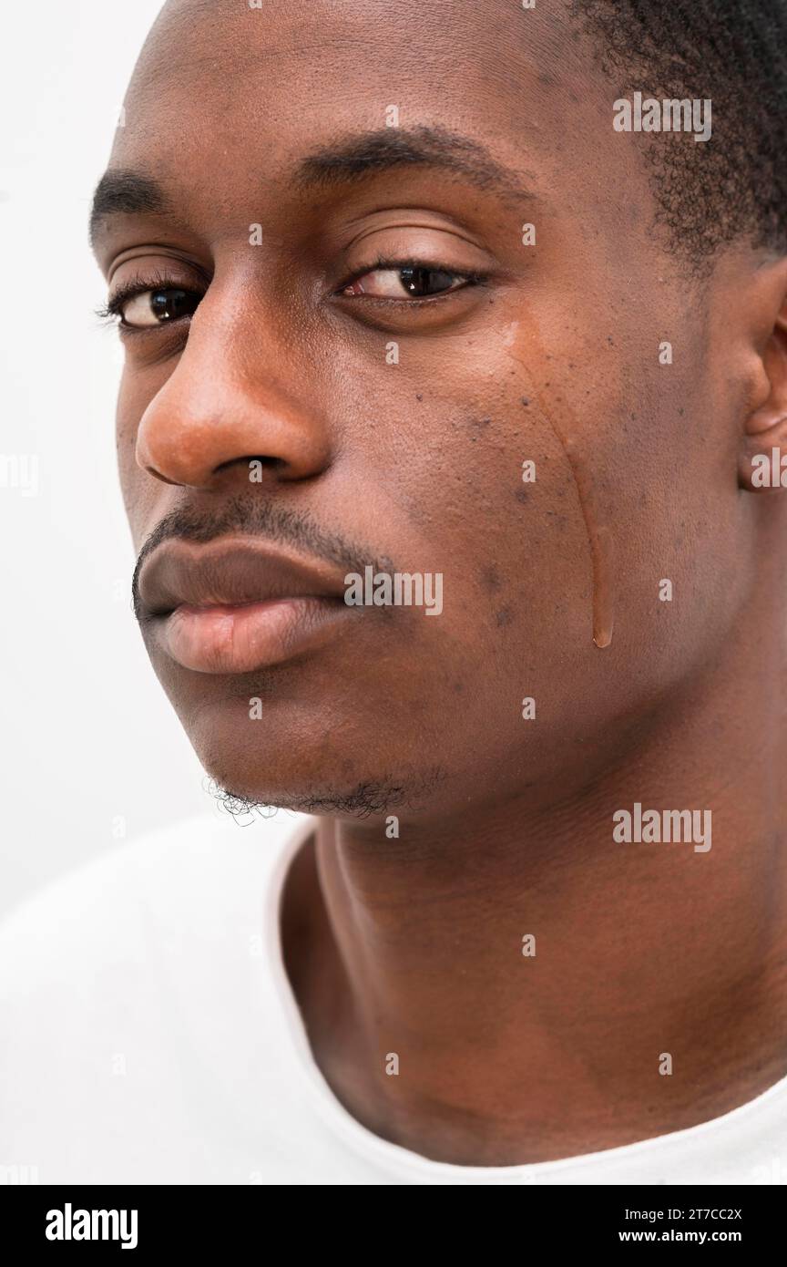 Face crying afro american man hi-res stock photography and images - Alamy