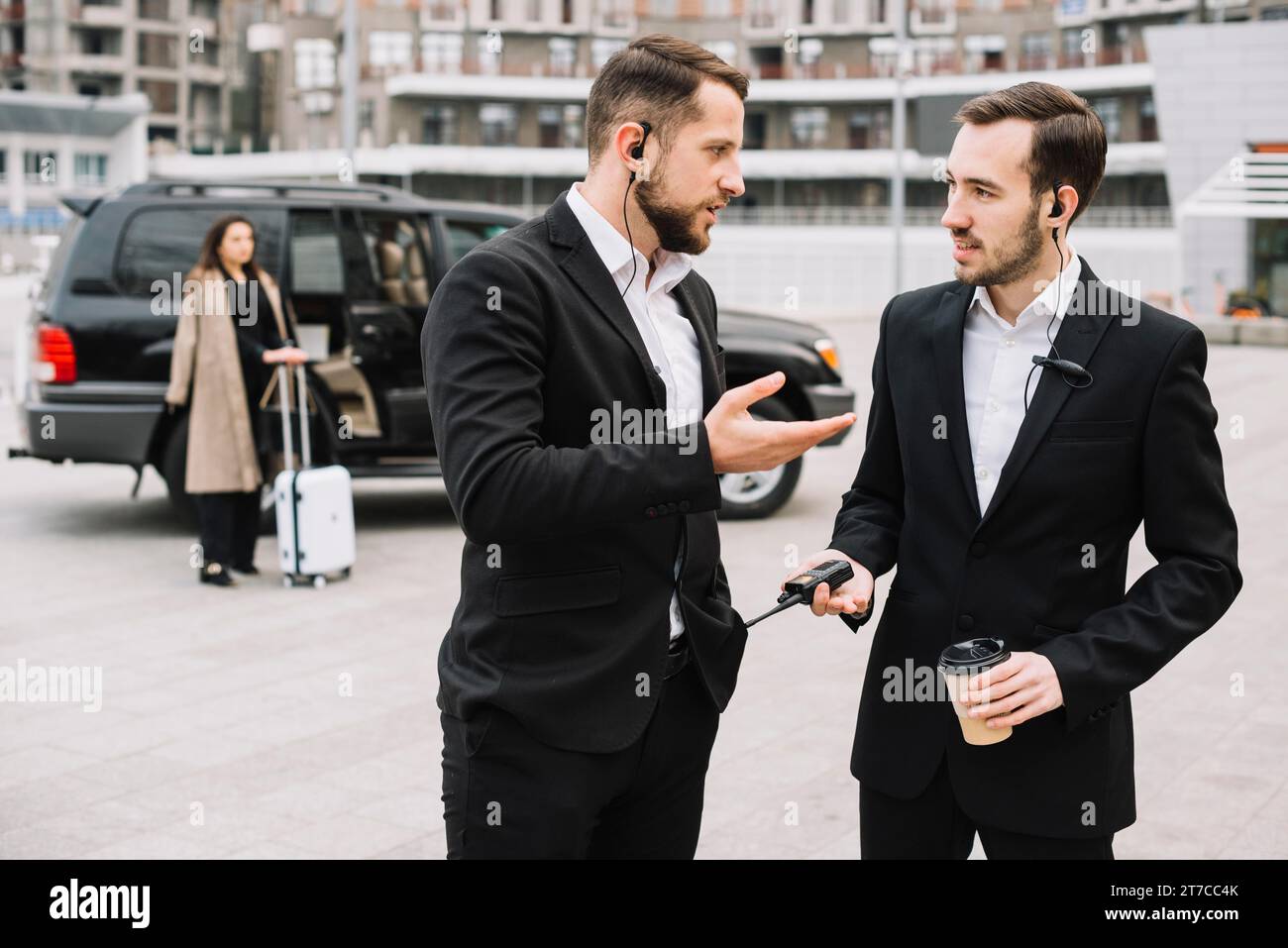 Security men working together Stock Photo - Alamy