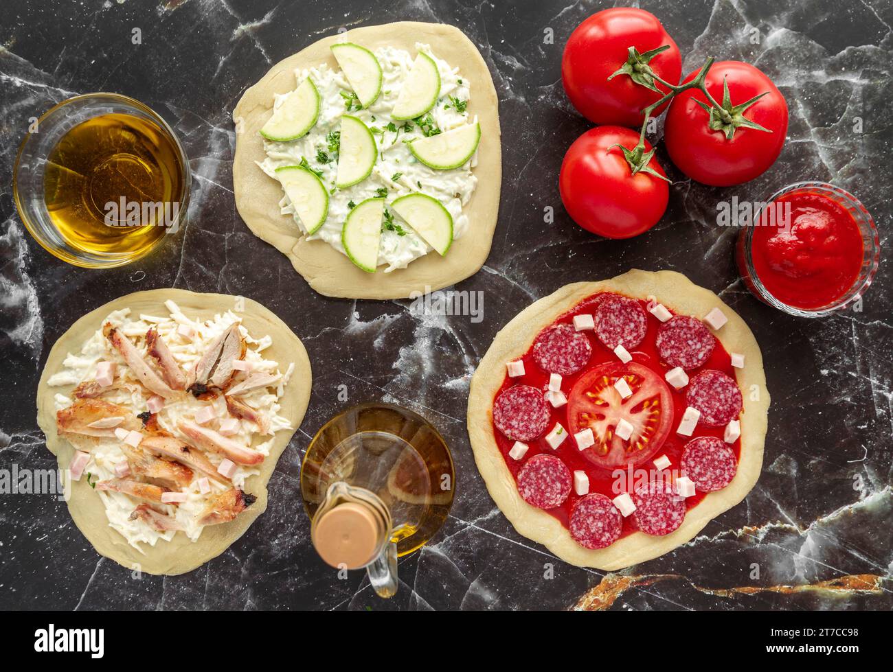 Tasty traditional pizza composition 6 Stock Photo - Alamy