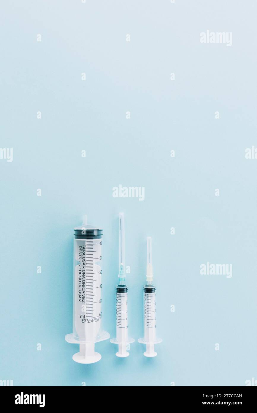 Three different type transparent syringe against blue background Stock ...