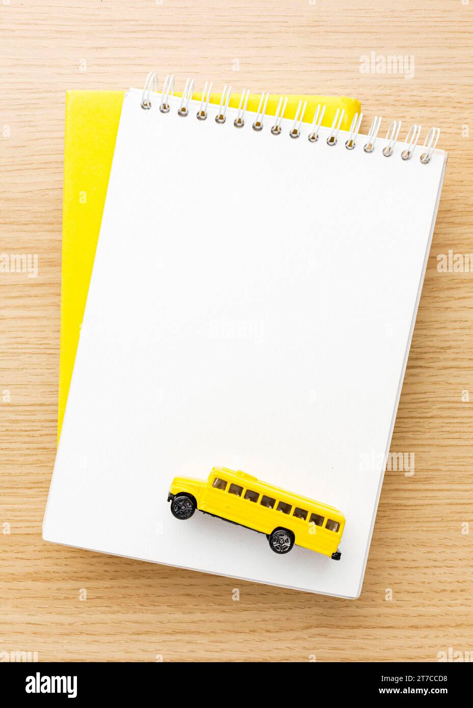 Top view notebooks with school bus Stock Photo - Alamy