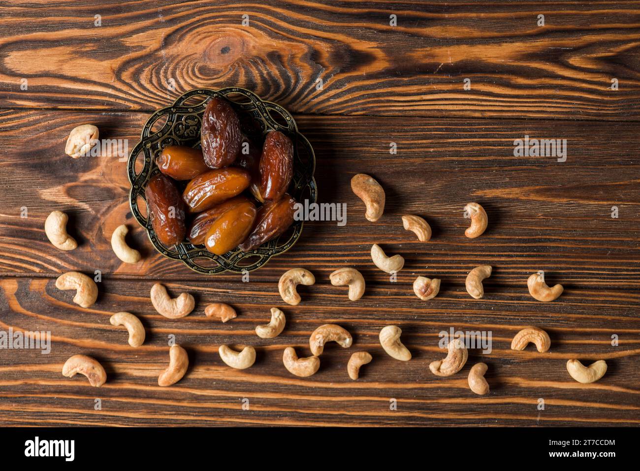 Top view dates metal plate Stock Photo - Alamy