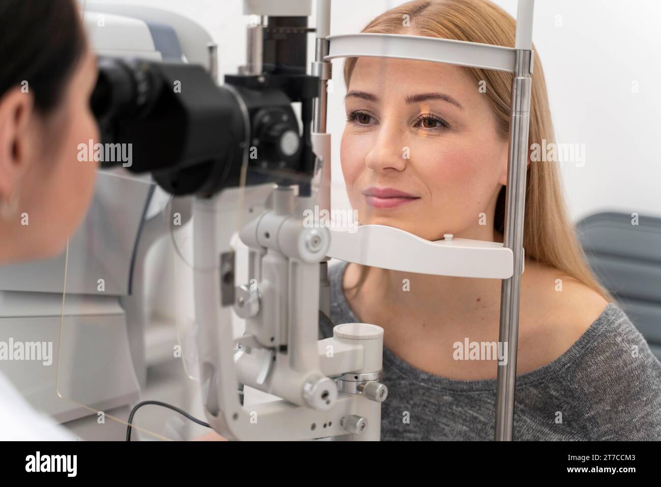 Woman eyes consult 4 Stock Photo - Alamy