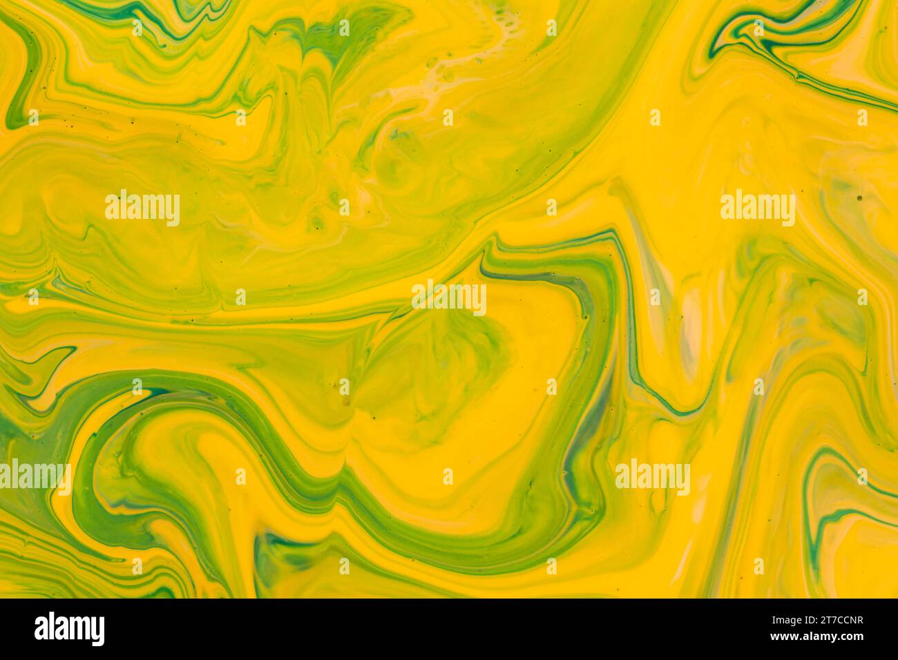 Yellow fluid acrylic pour painting Stock Photo - Alamy