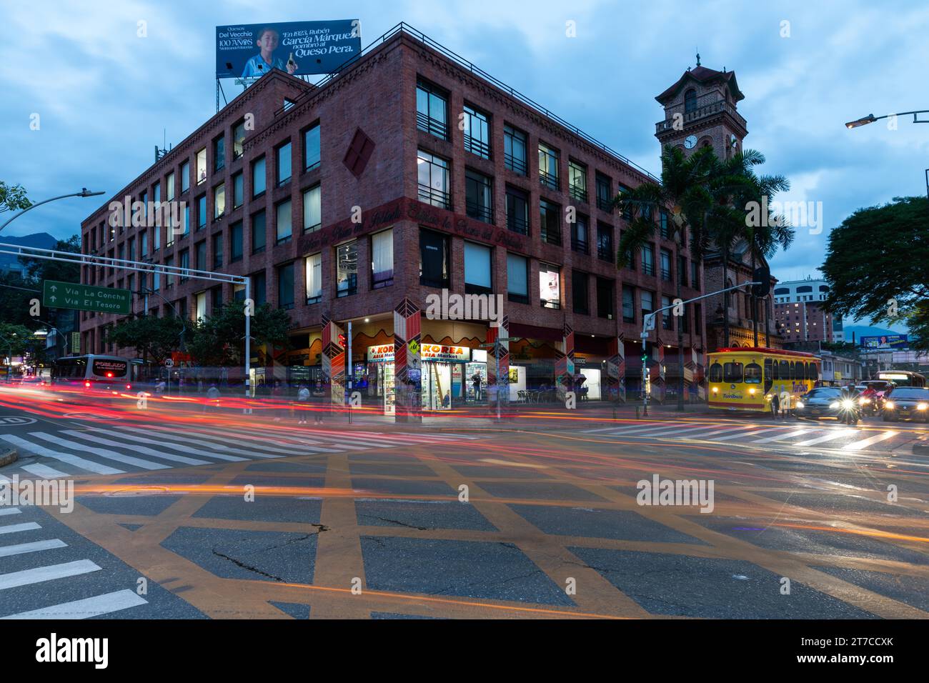 Residential and commercial building, traffic, light traces, street ...