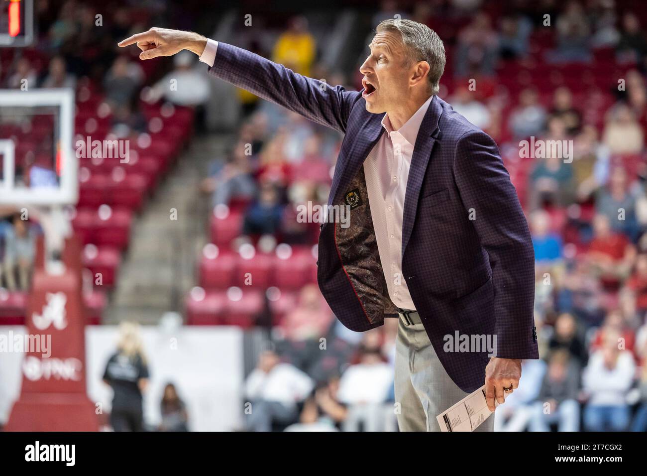 Alabama head coach Nate Oats signals to his players during the second ...